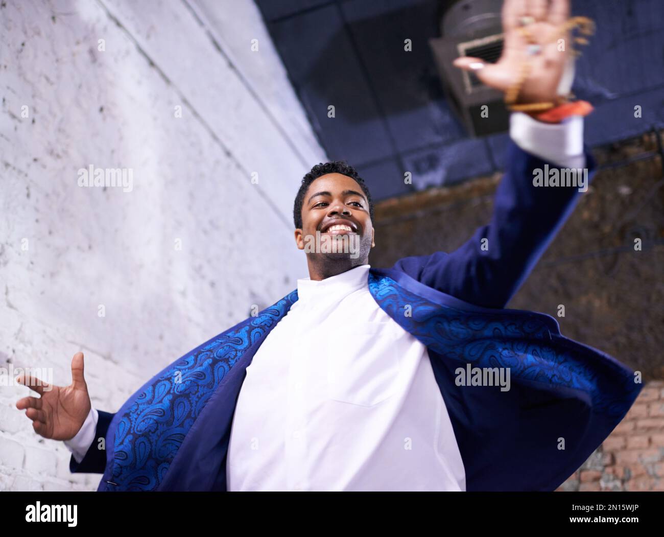 Hes putting on quite the show. a handsome man spreading the word of the ...