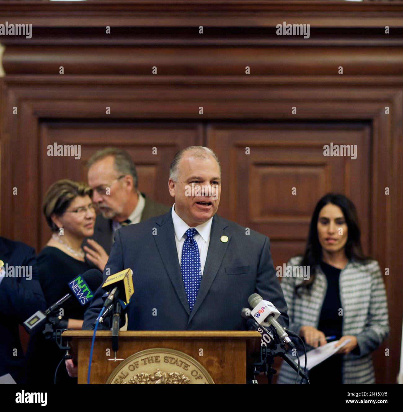 New Jersey Sen. Jim Whelan, second left, D-Northfield, N.J., talks with ...