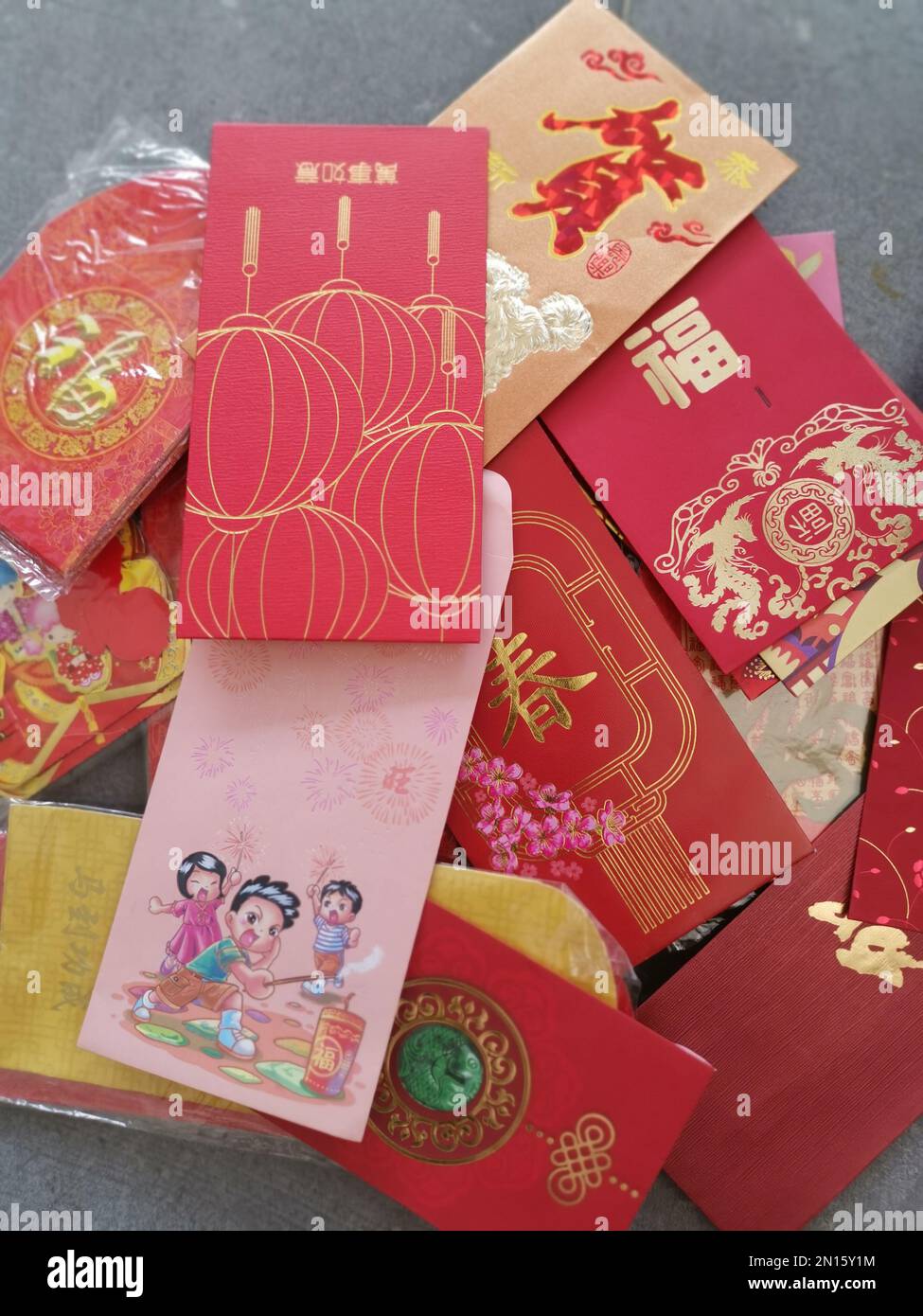 A pile of red packet containing gift of money packed inside given as ...