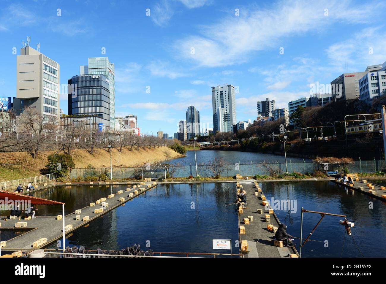 Fishing at the pools of the Ichigaya fishing center along the Edo ...