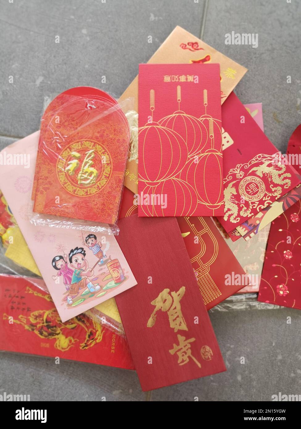 A pile of red packet containing gift of money packed inside given as ...