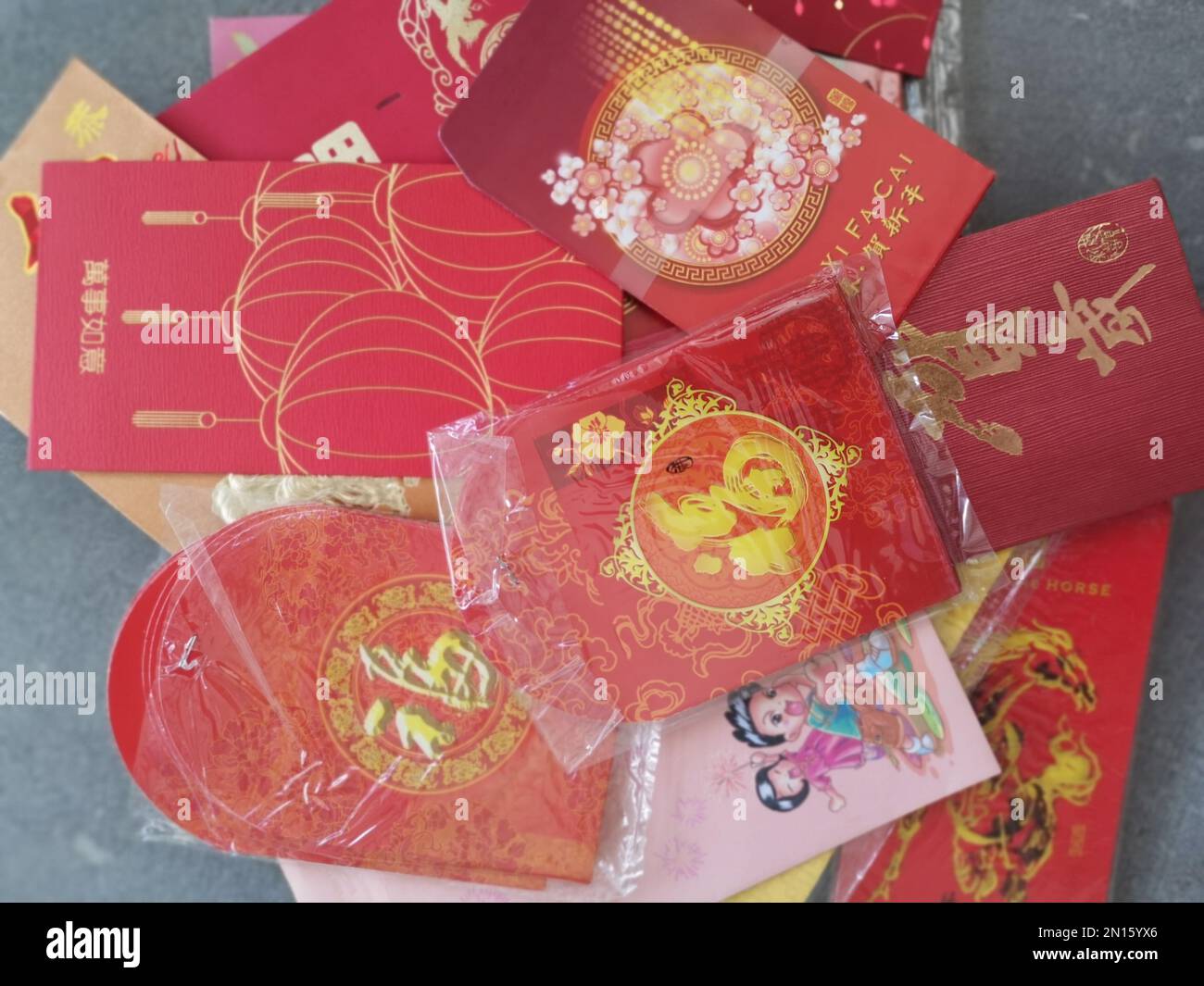 A pile of red packet containing gift of money packed inside given as ...