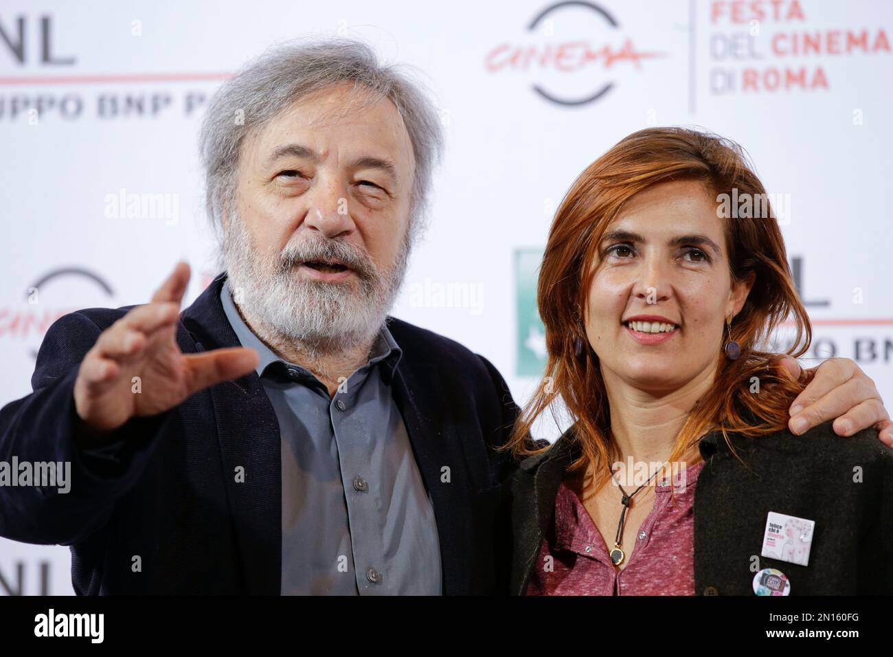 Directors Gianni Amelio, left, and Cecilia Pagliarani pose for photos ...