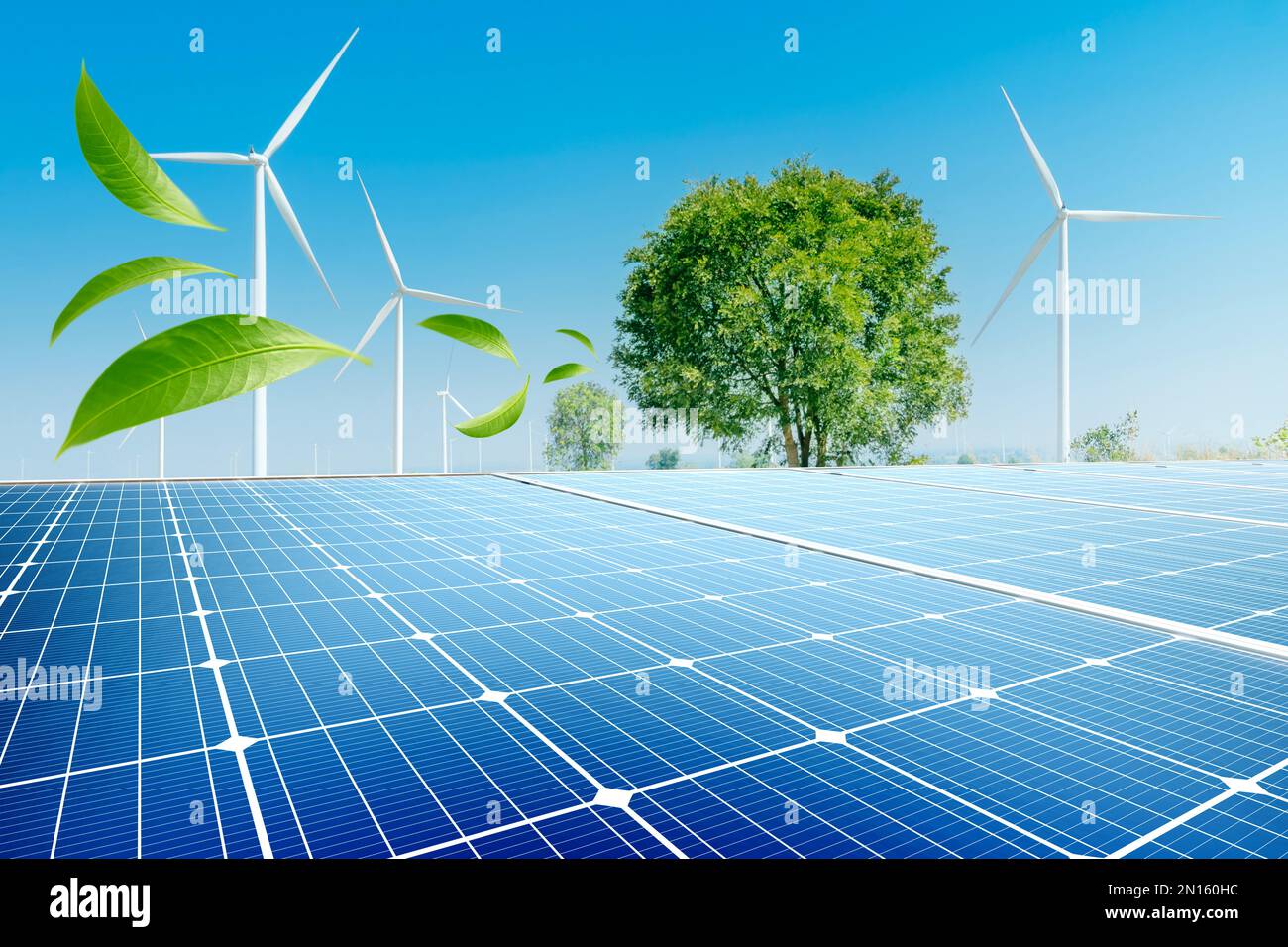 wind turbine and solar panel,green leaf blowing in sky.renewable energy ...