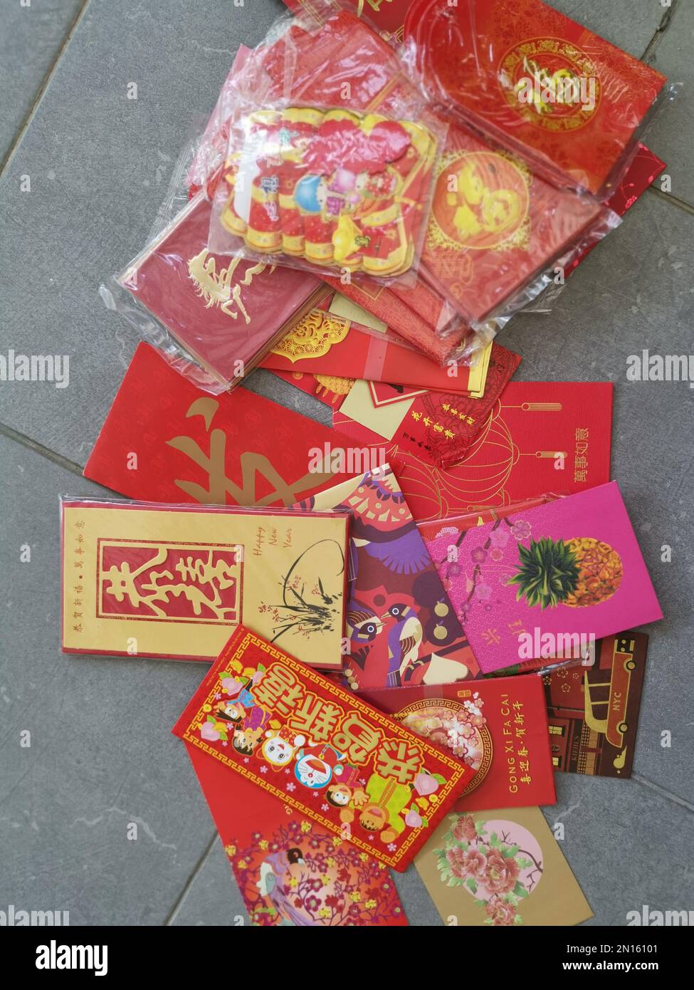 A pile of red packet containing gift of money packed inside given as ...