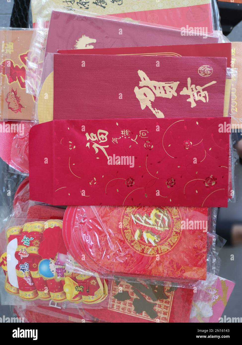 A pile of red packet containing gift of money packed inside given as ...