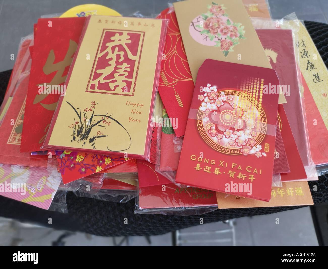 A pile of red packet containing gift of money packed inside given as ...