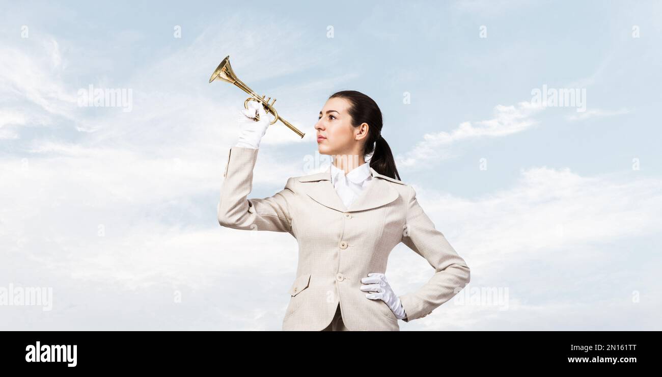 Young female trumpet player hi-res stock photography and images - Alamy