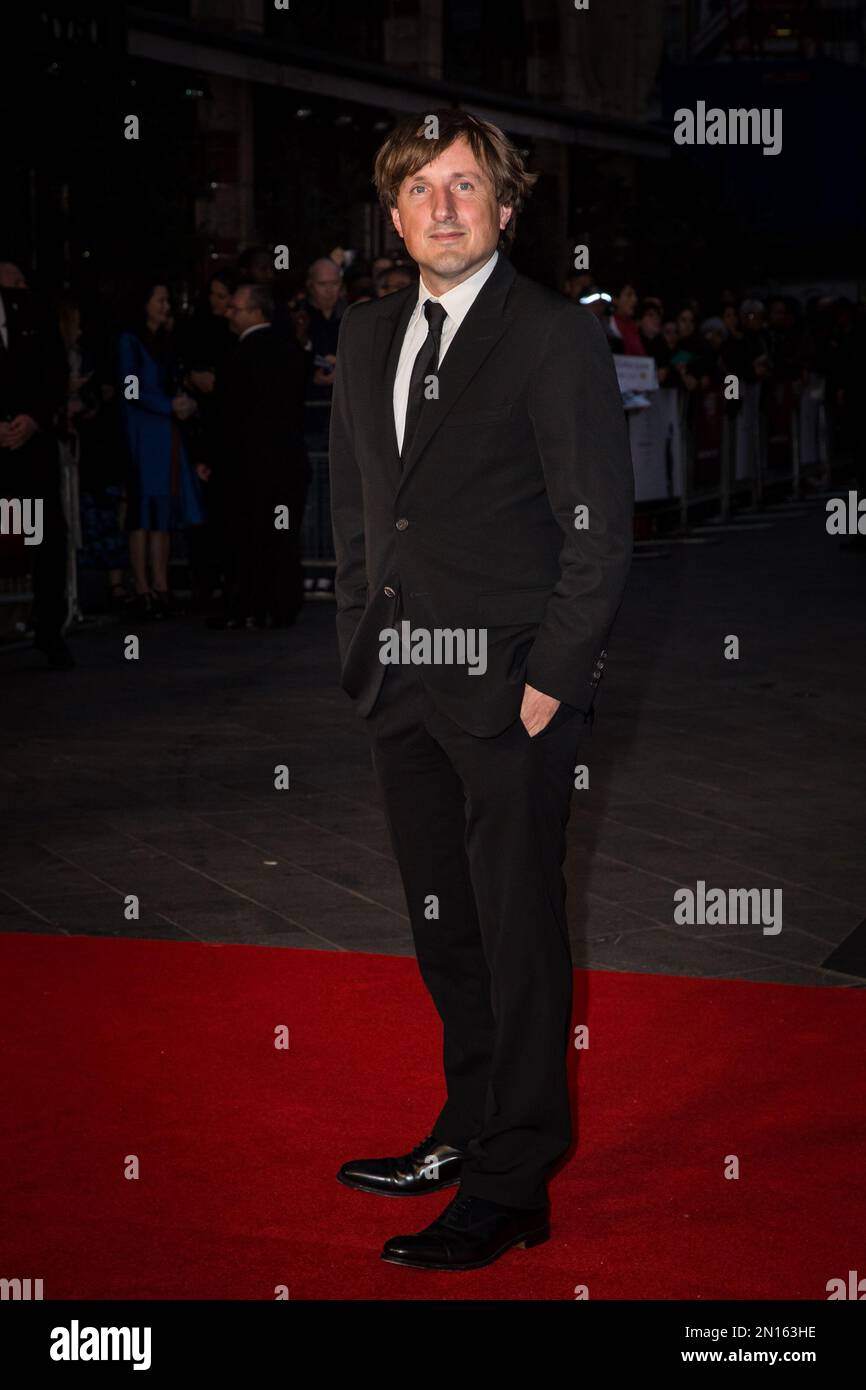 Daniel Pemberton poses for photographers upon arrival at the premiere ...