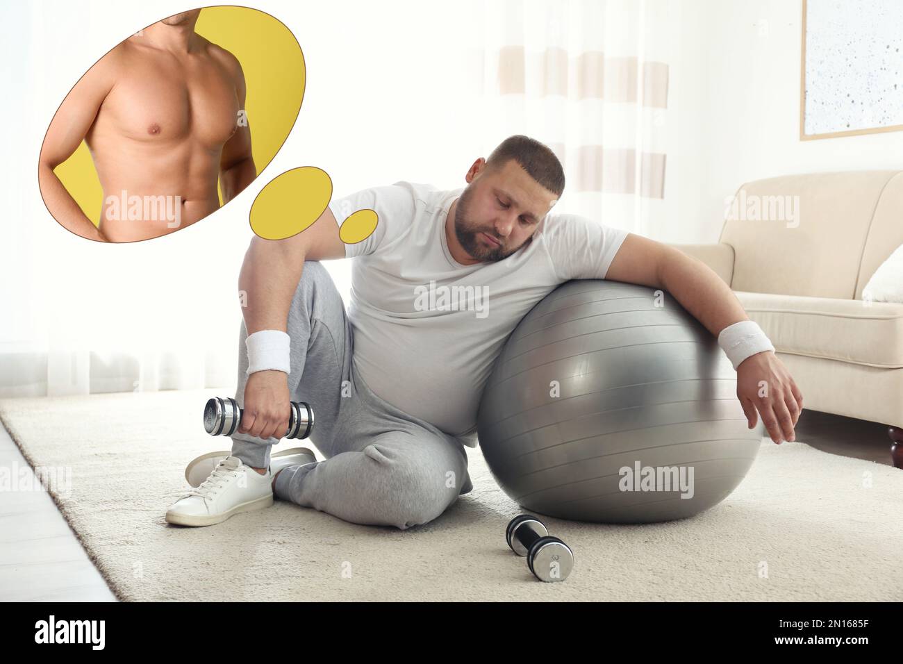 Overweight man dreaming about muscular body while having break in ...