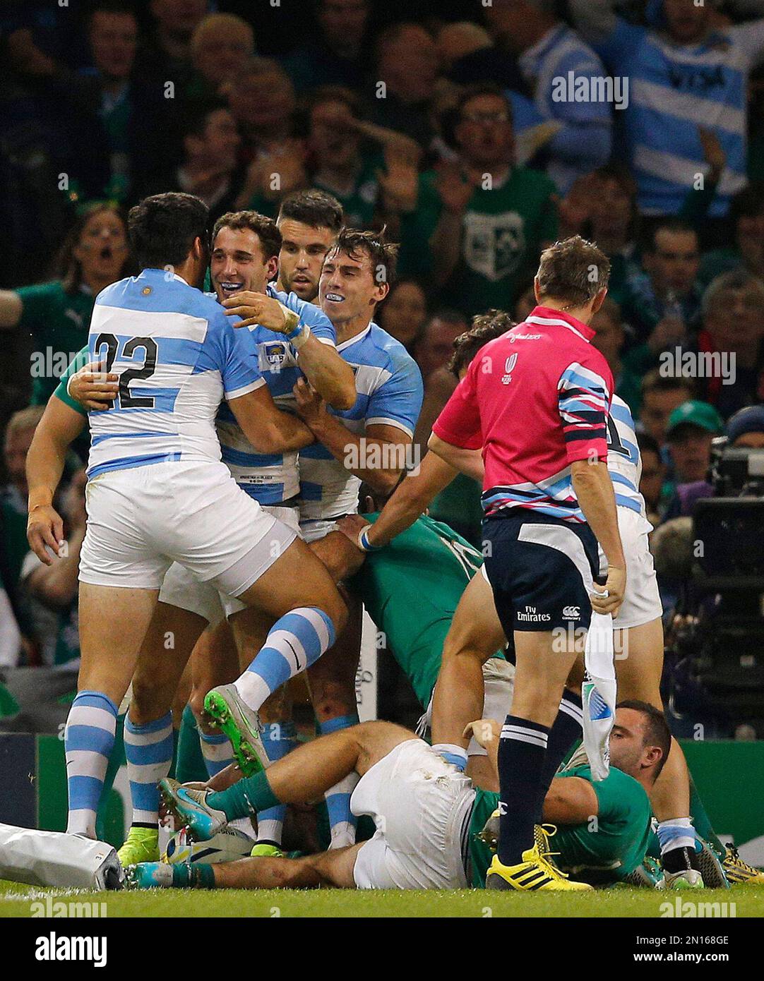 Argentina players celebrate after Joaquin Tuculet, venter. scored a try ...
