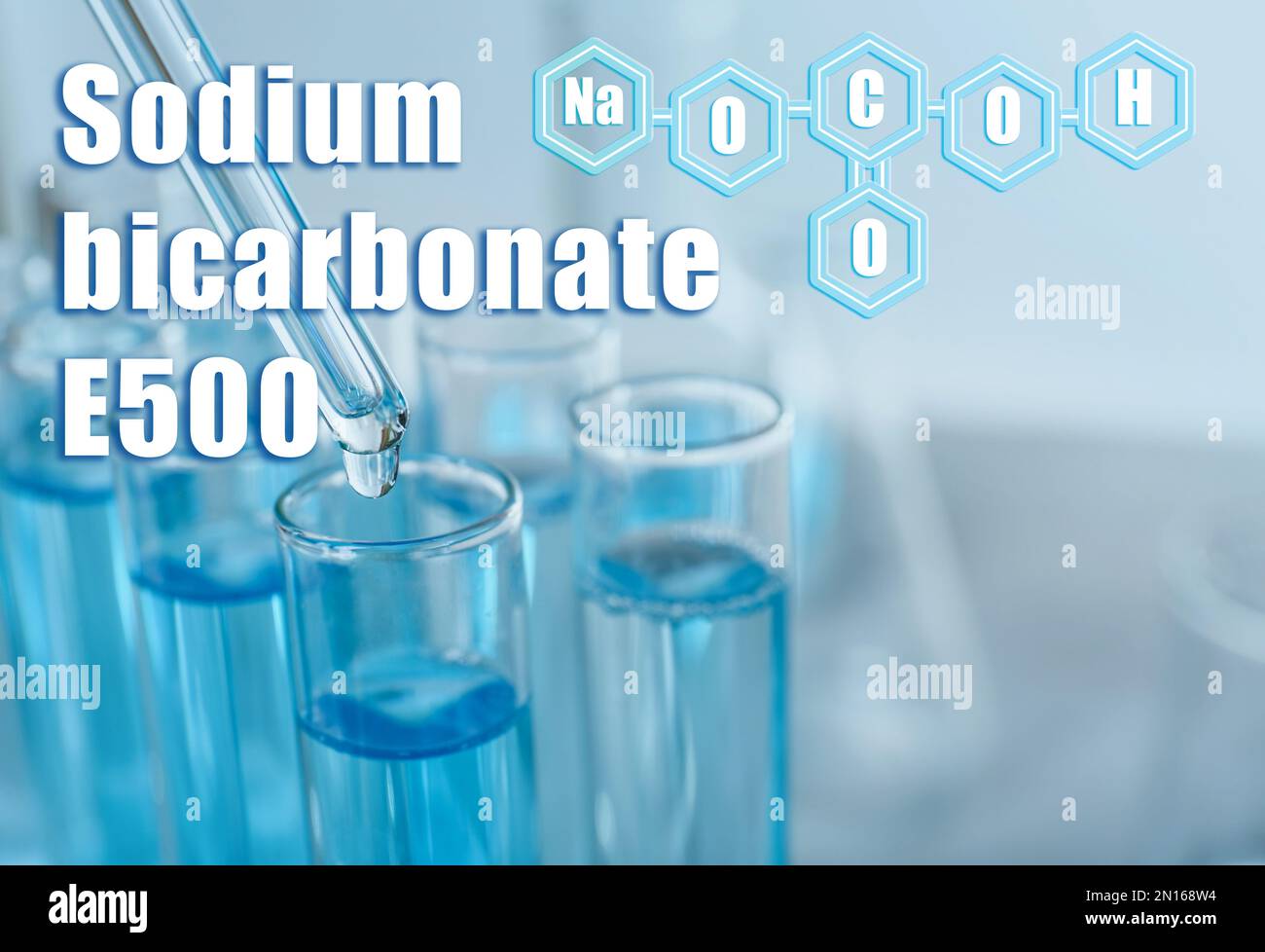 Text Sodium bicarbonate E500 with soda formula and test tubes on ...