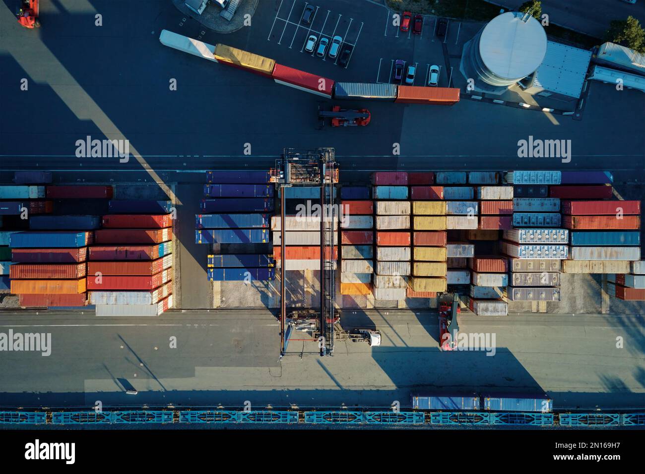 Shipping containers in terminal, Unloading containers in warehouse on ...