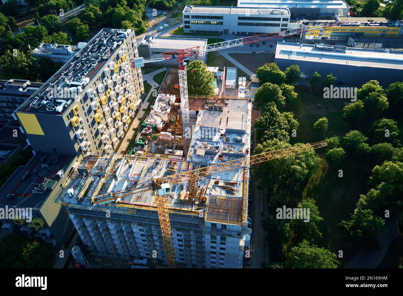 Aerial view of construction site with residential building under ...