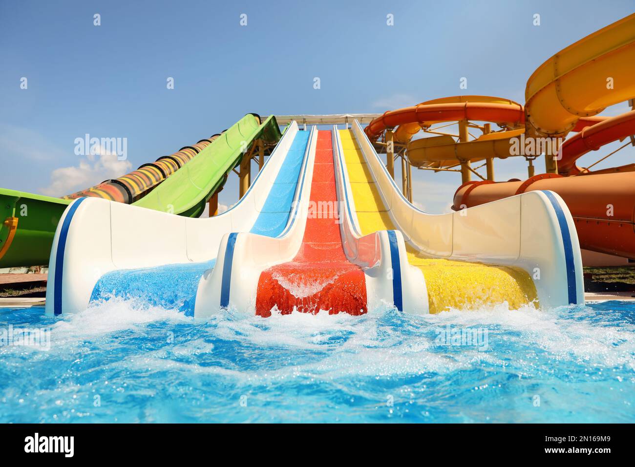 Colorful slides in water park. Summer vacation Stock Photo - Alamy