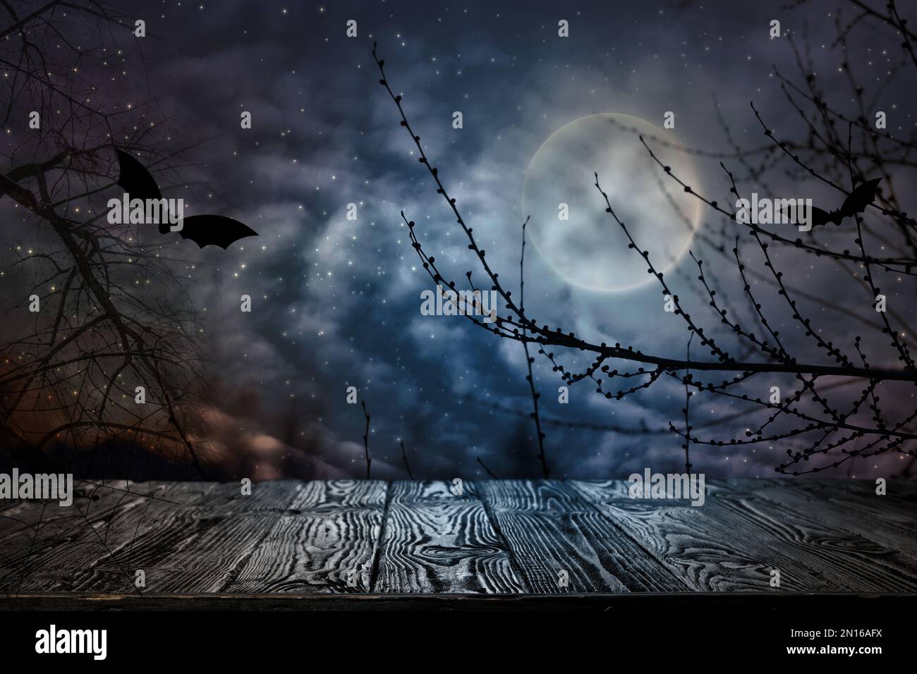 Wooden surface and bats flying in night sky with full moon. Halloween ...