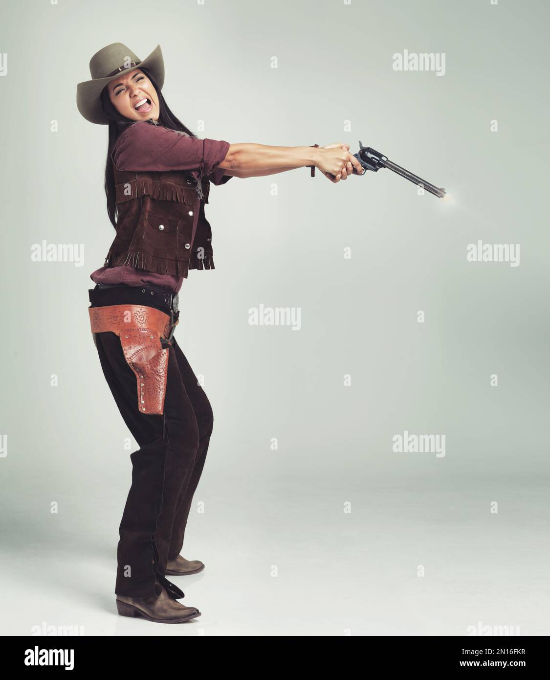 Im the sheriff around these parts...Full-length shot of an attractive ...