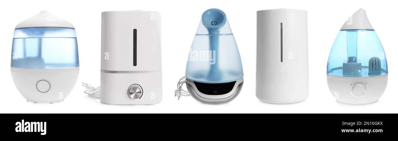 Set of modern air humidifiers on white background Stock Photo - Alamy