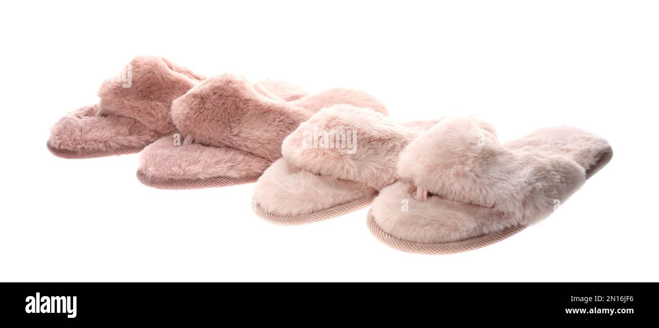 Different stylish soft slippers on white background Stock Photo - Alamy