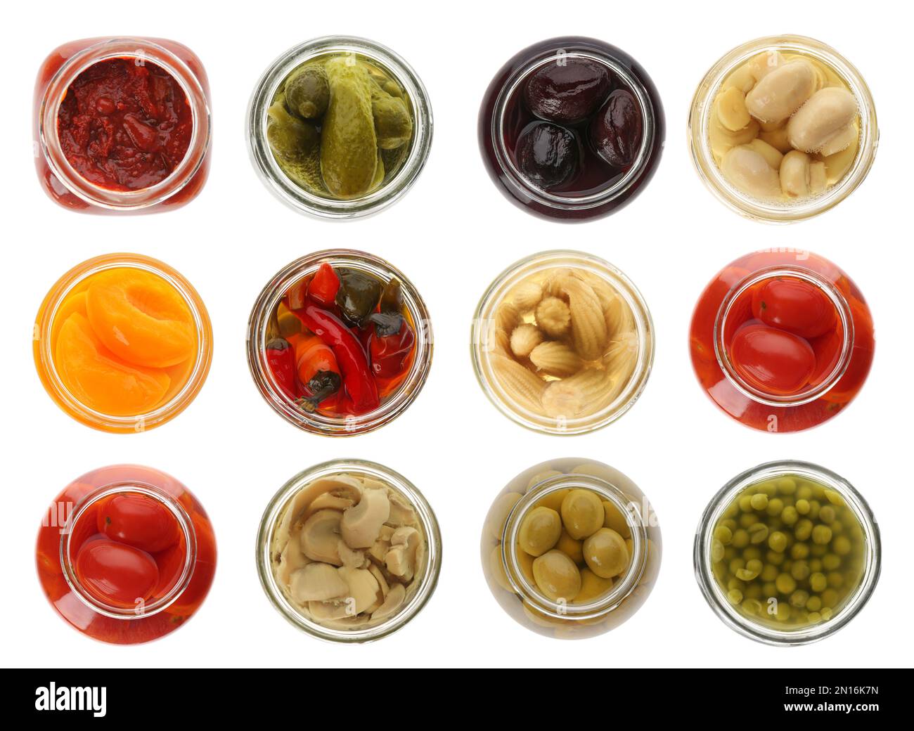 Set of jars with pickled foods on white background, top view Stock ...