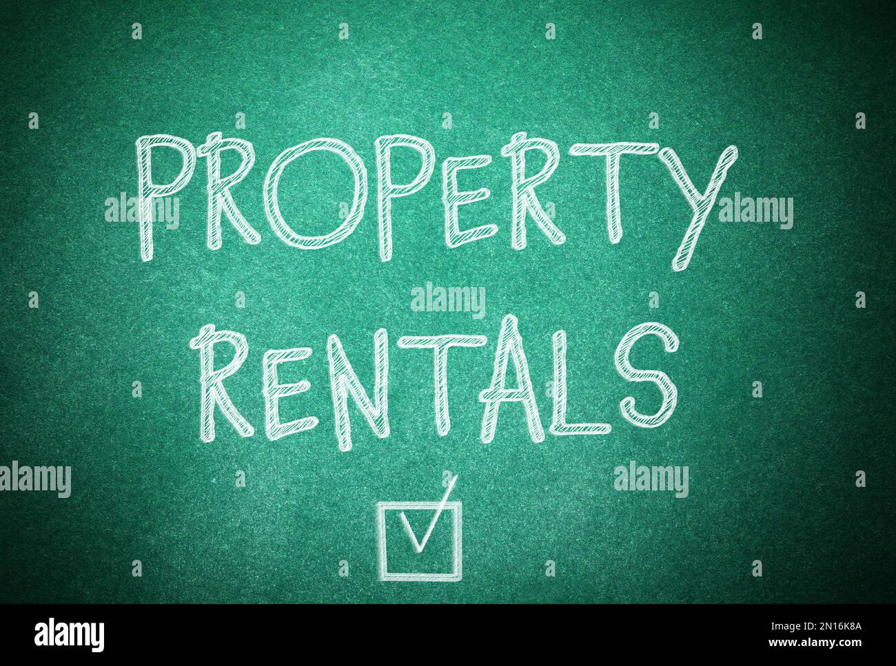 Text Property Rentals and check mark on green chalkboard Stock Photo ...