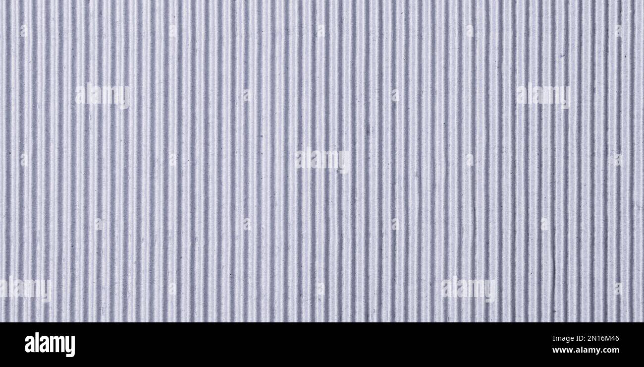 Wall paper design. Grey corrugated sheet of cardboard as background ...