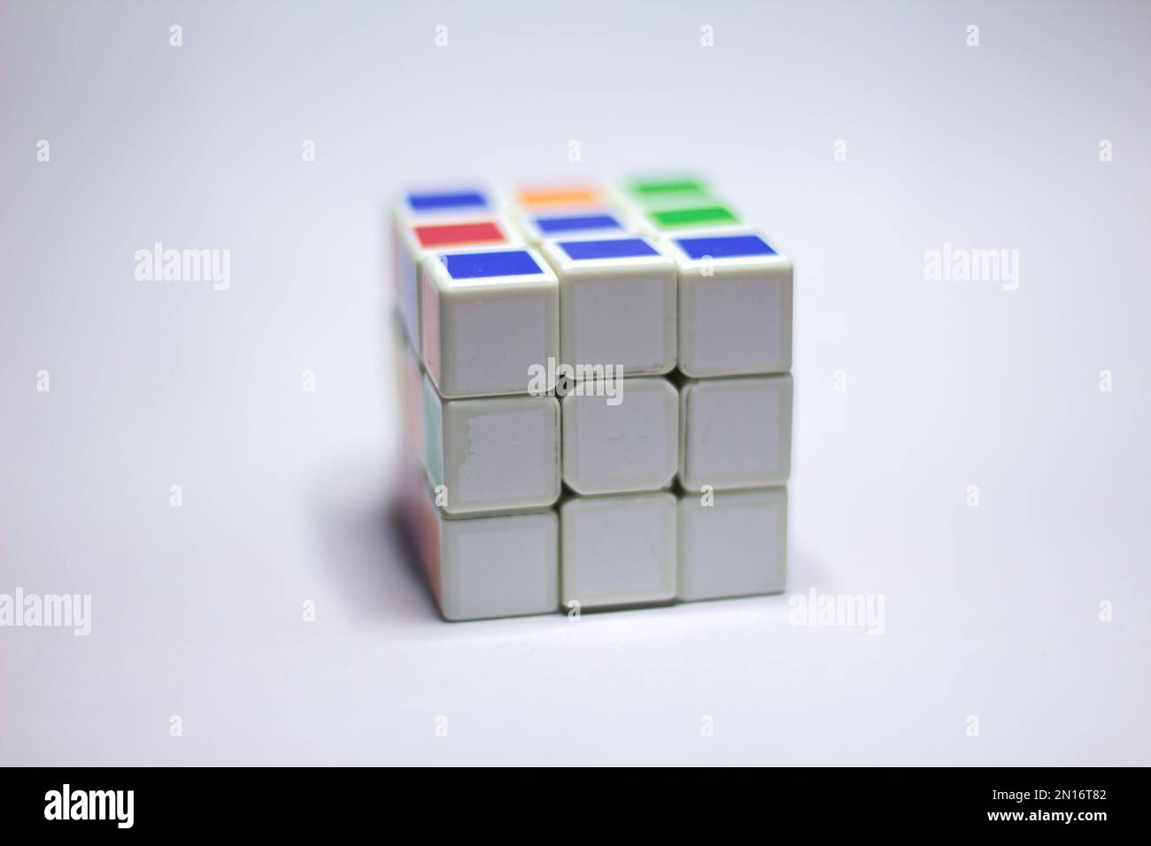 The Rubik's cube on white background with space for text Stock Photo ...