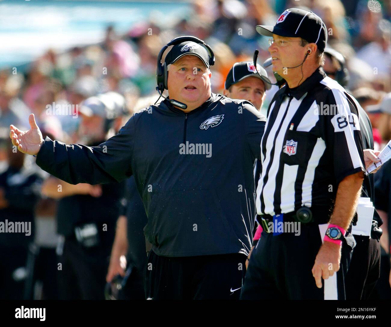 Philadelphia Eagles head coach Chip Kelly talks with line judge Mark ...