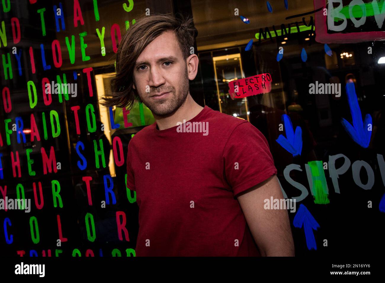 Stuart Semple poses in front of his artwork upon arrival at the Artist ...