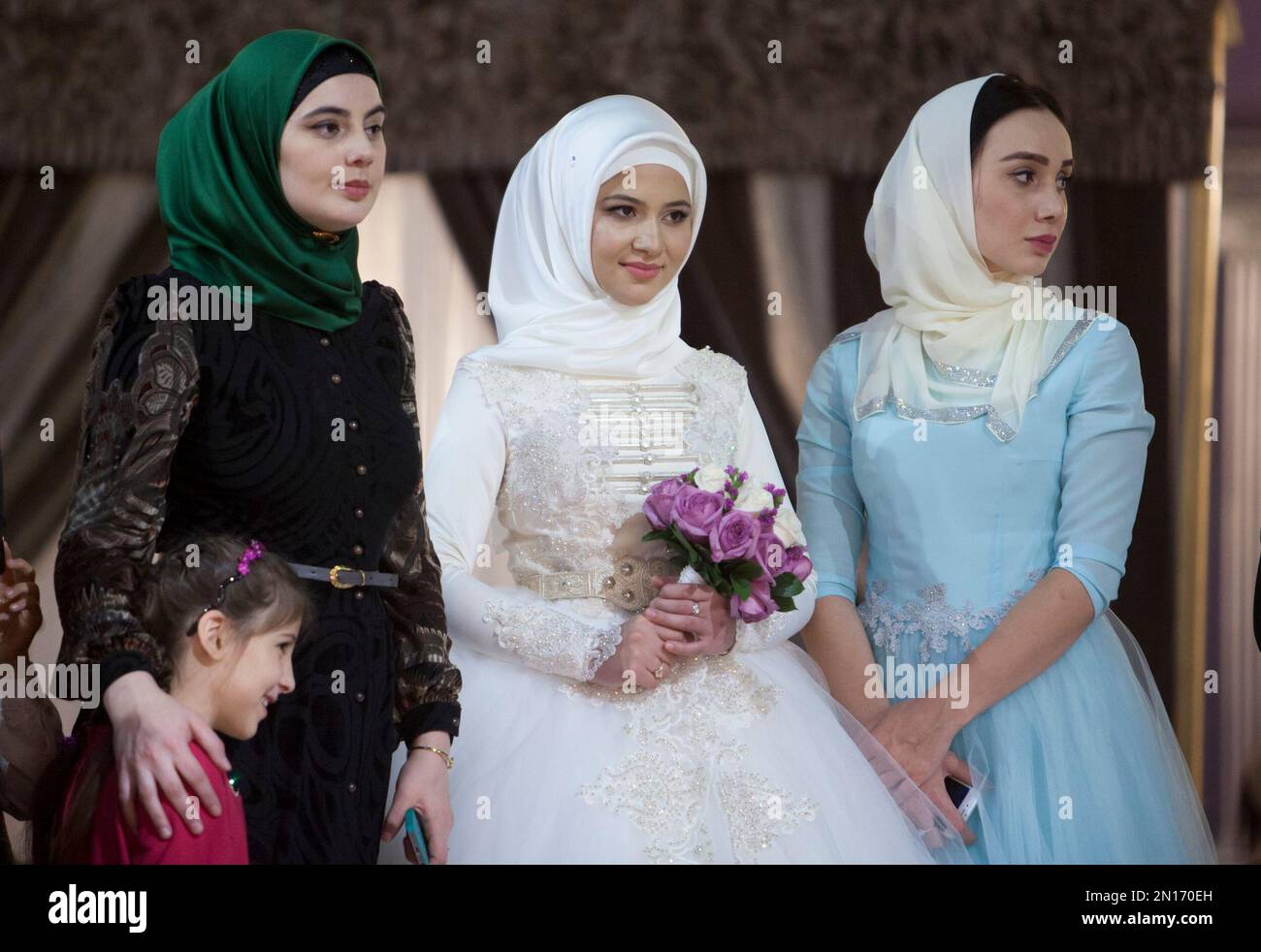 In this Wednesday, Oct. 14, 2015, photo, a Chechen bride dressed in ...