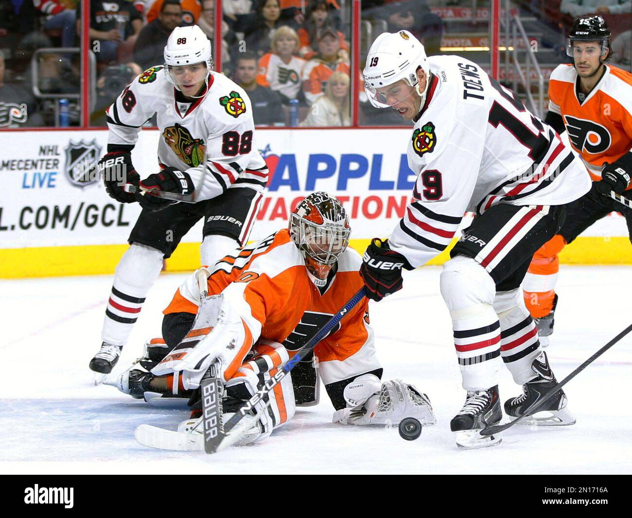 Philadelphia Flyers goalie Michal Neuvirth, center, of Czech Republic ...