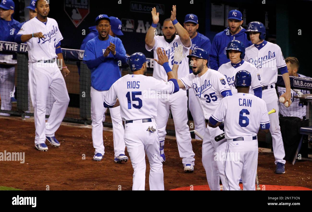 Kansas City Royals' Alex Rios (15) celebrates with teammates after ...