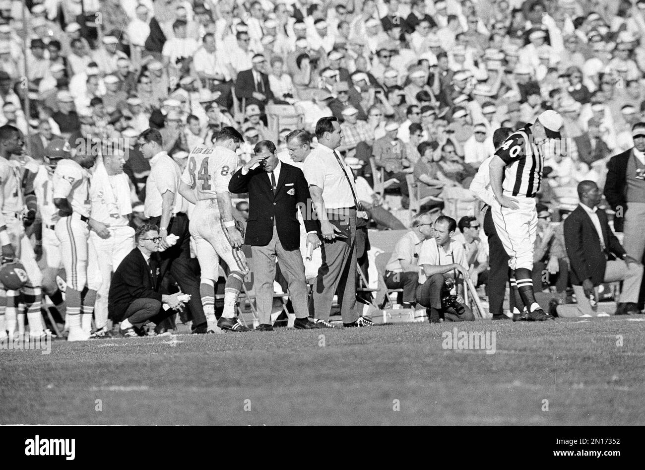 Coach Hank Stram, dark jacket, of the Kansas City Chiefs suffers ...