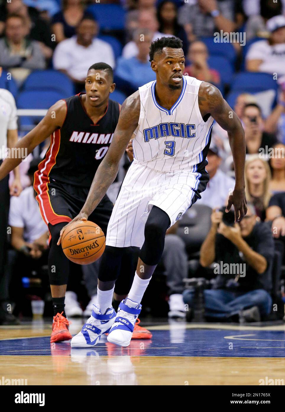 Orlando Magic center Dewayne Dedmon (3) moves to the basket past Miami ...