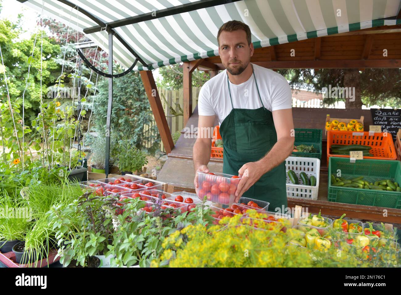 farmer sells fruit and vegetables from his own cultivation fresh from ...