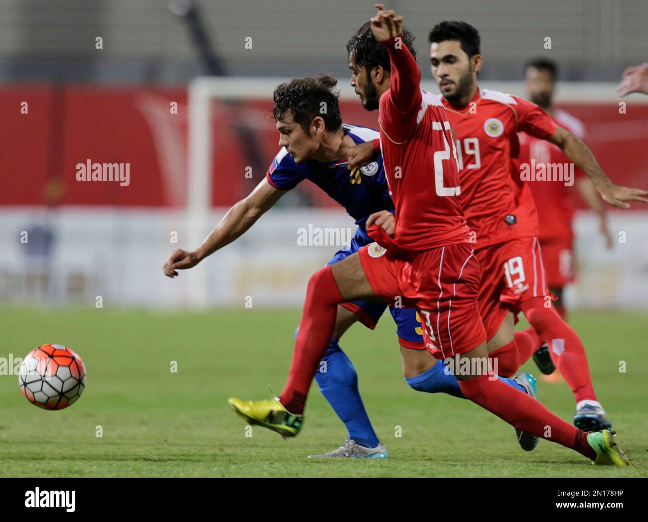 Bahrain's Rashid al-Hooti, center, and the Philippines' Philip James ...