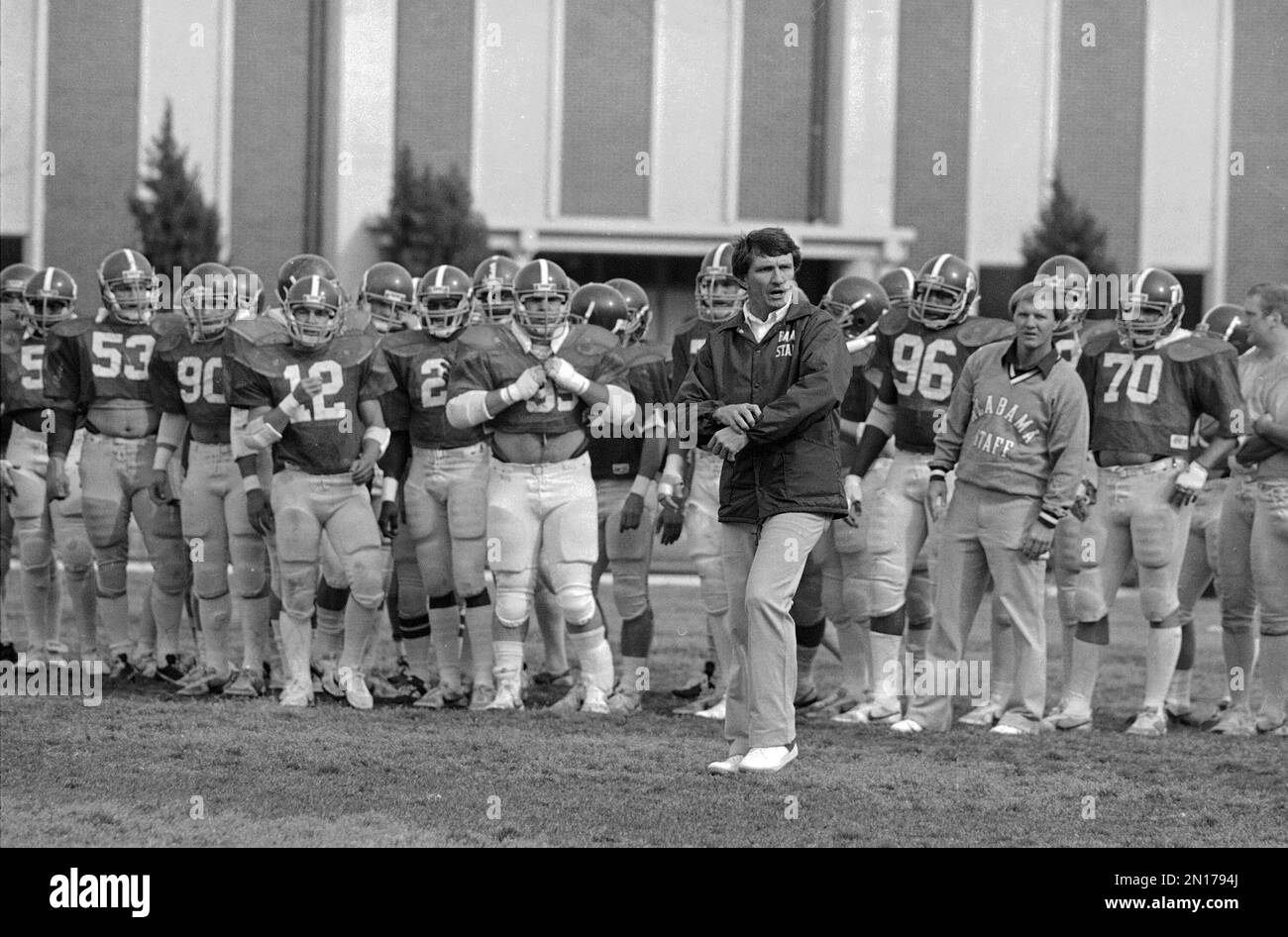 Alabama head coach Ray Perkins leads his players on the first day of ...