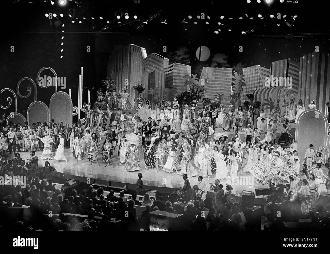 Contestants from some 82 countries crowd the stage in their native ...