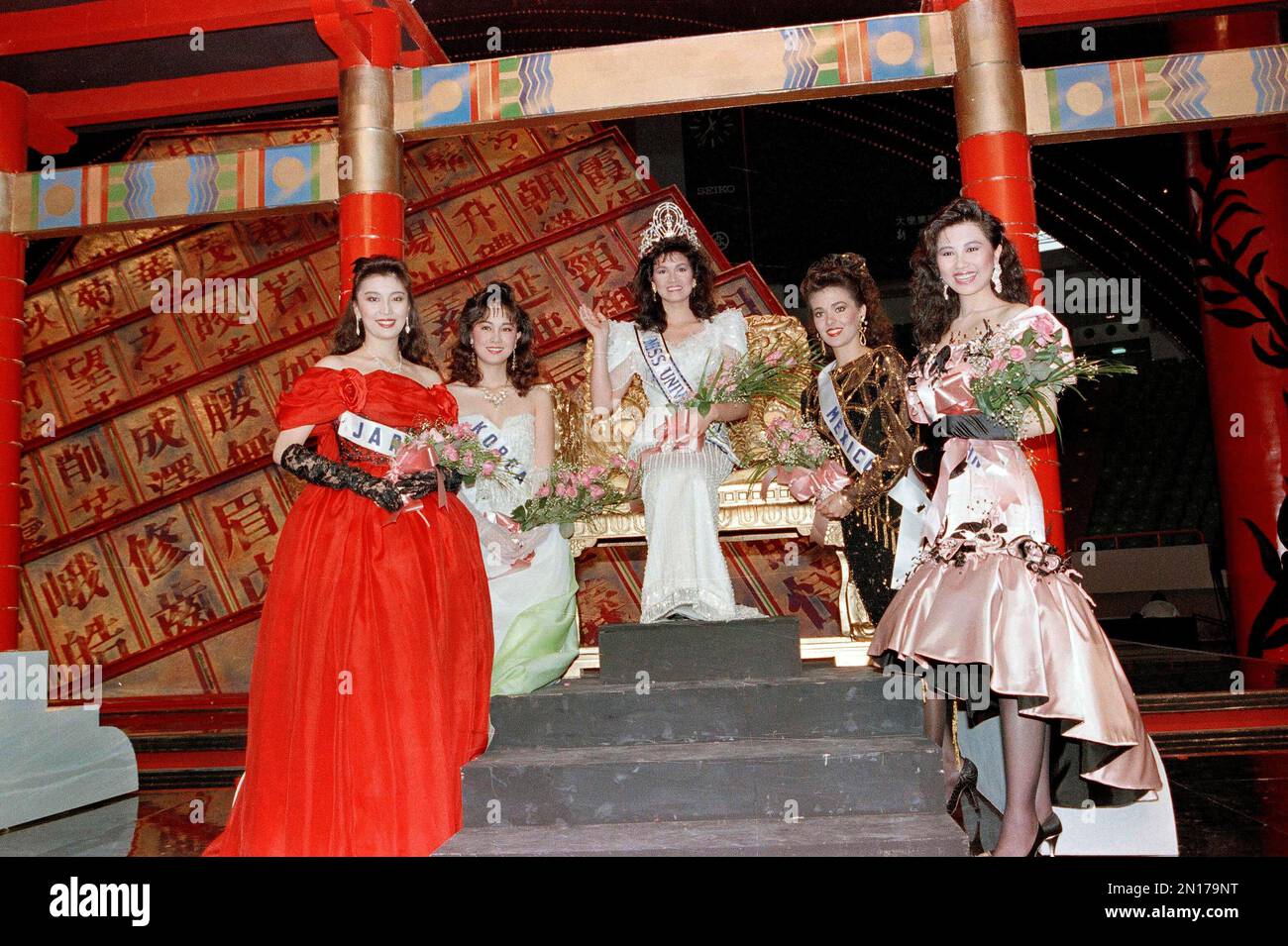 Miss Universe, Porntip Nakhirunkanok of Thailand, sits with her court of four runners in Taipei ...