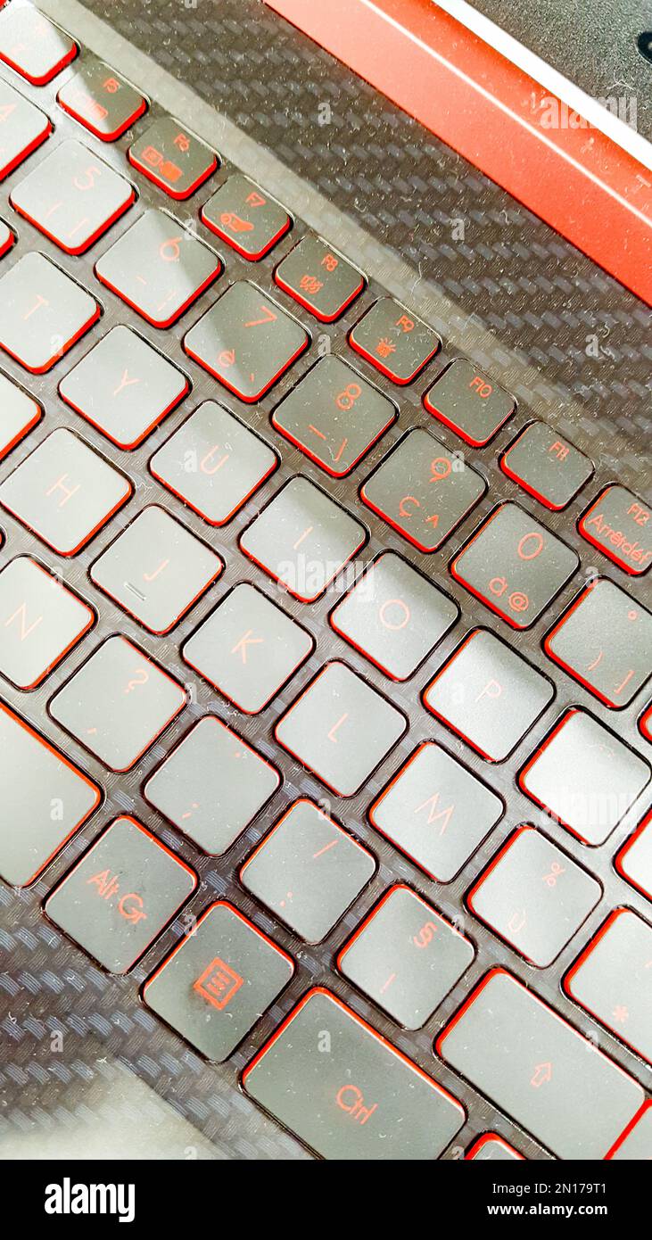 keyboard keys of the laptop Backlight red light Stock Photo - Alamy