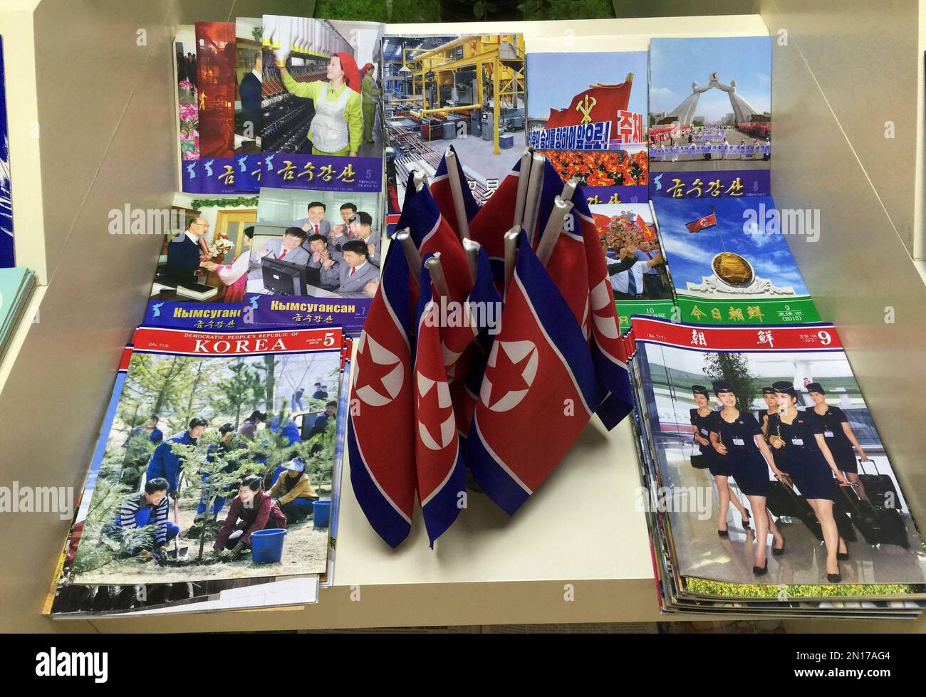 Pamphlets and flags for sale are on display at the Pyongyang Cultural ...