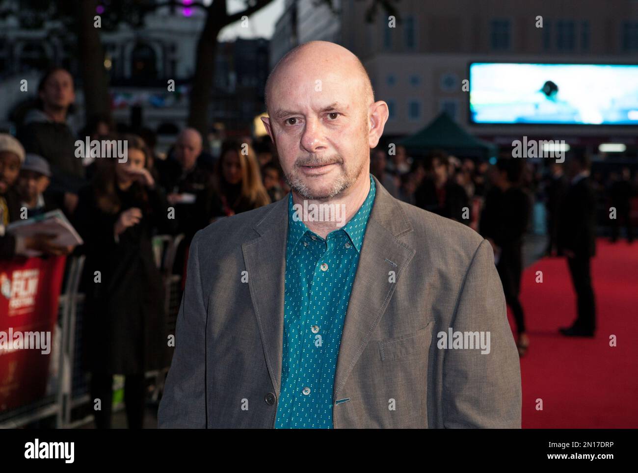 Writer Nick Hornby poses for photographers upon arrival at the Premiere ...