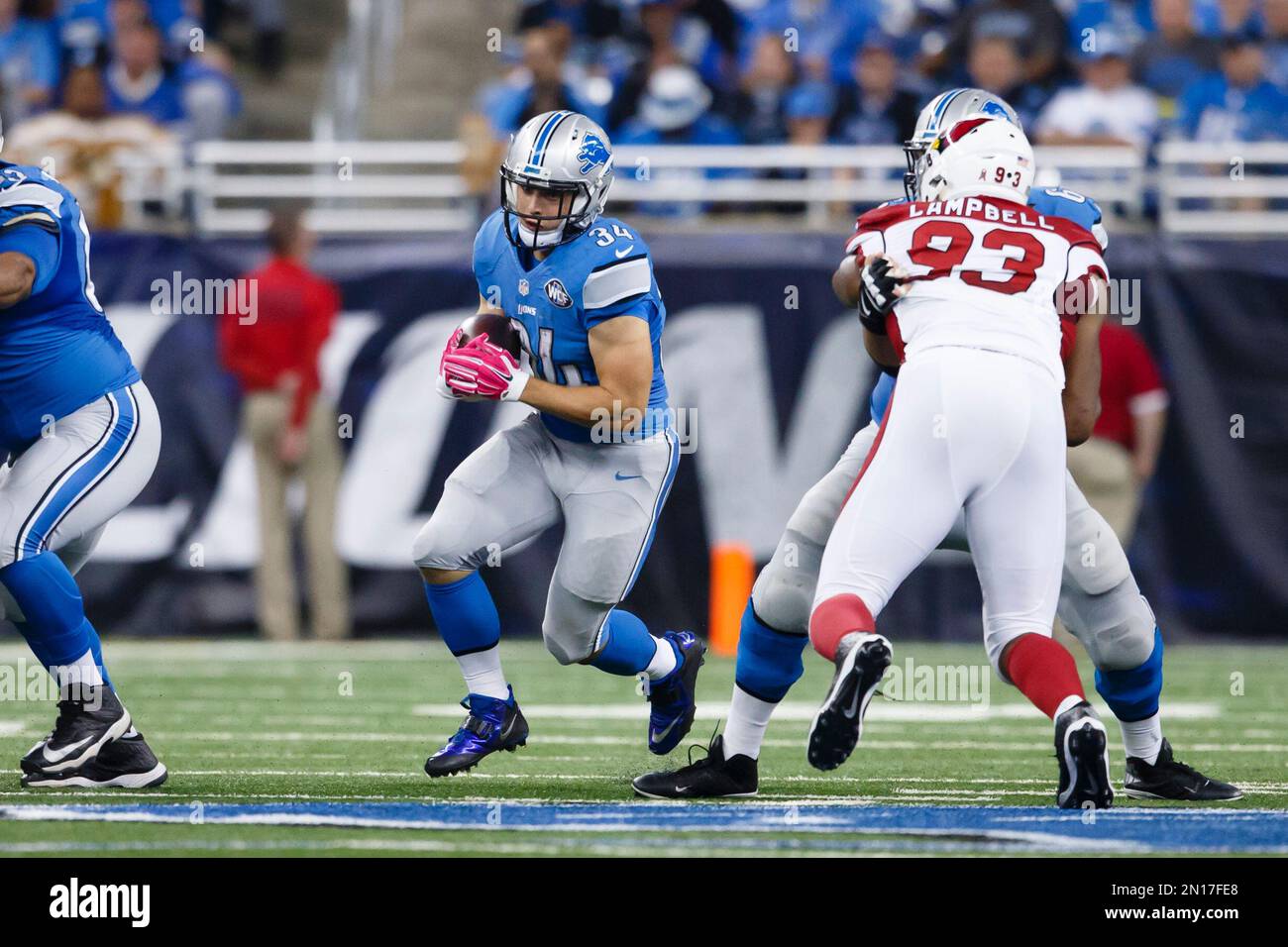 Detroit Lions fullback Zach Zenner (34) rushes against the Arizona ...