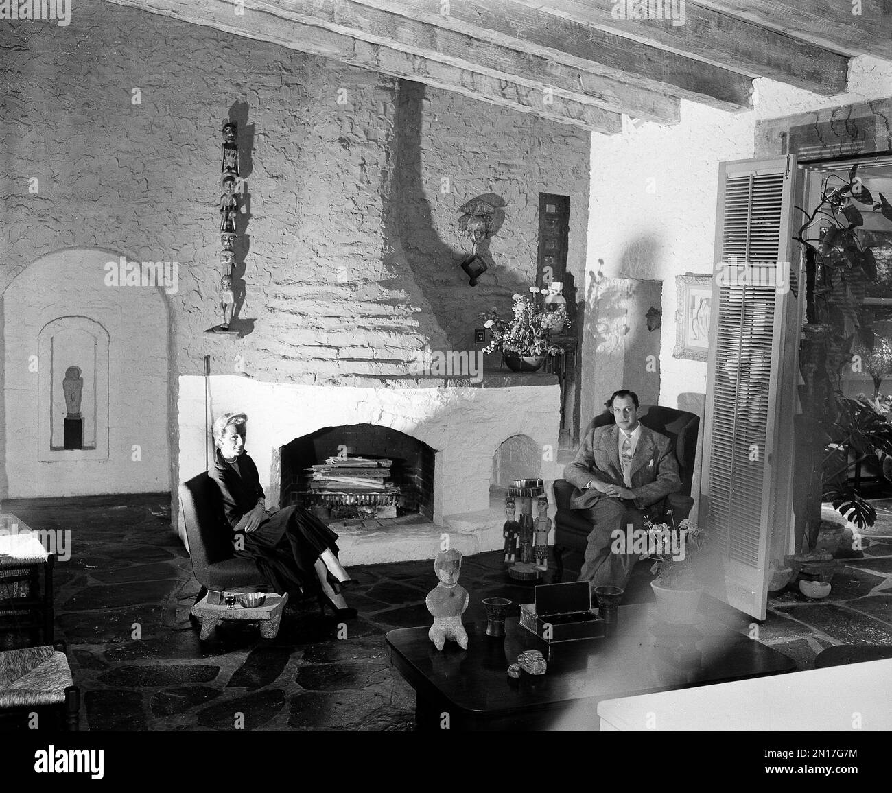 Actor Vincent Price and his wife Mary sit in the living room of their ...