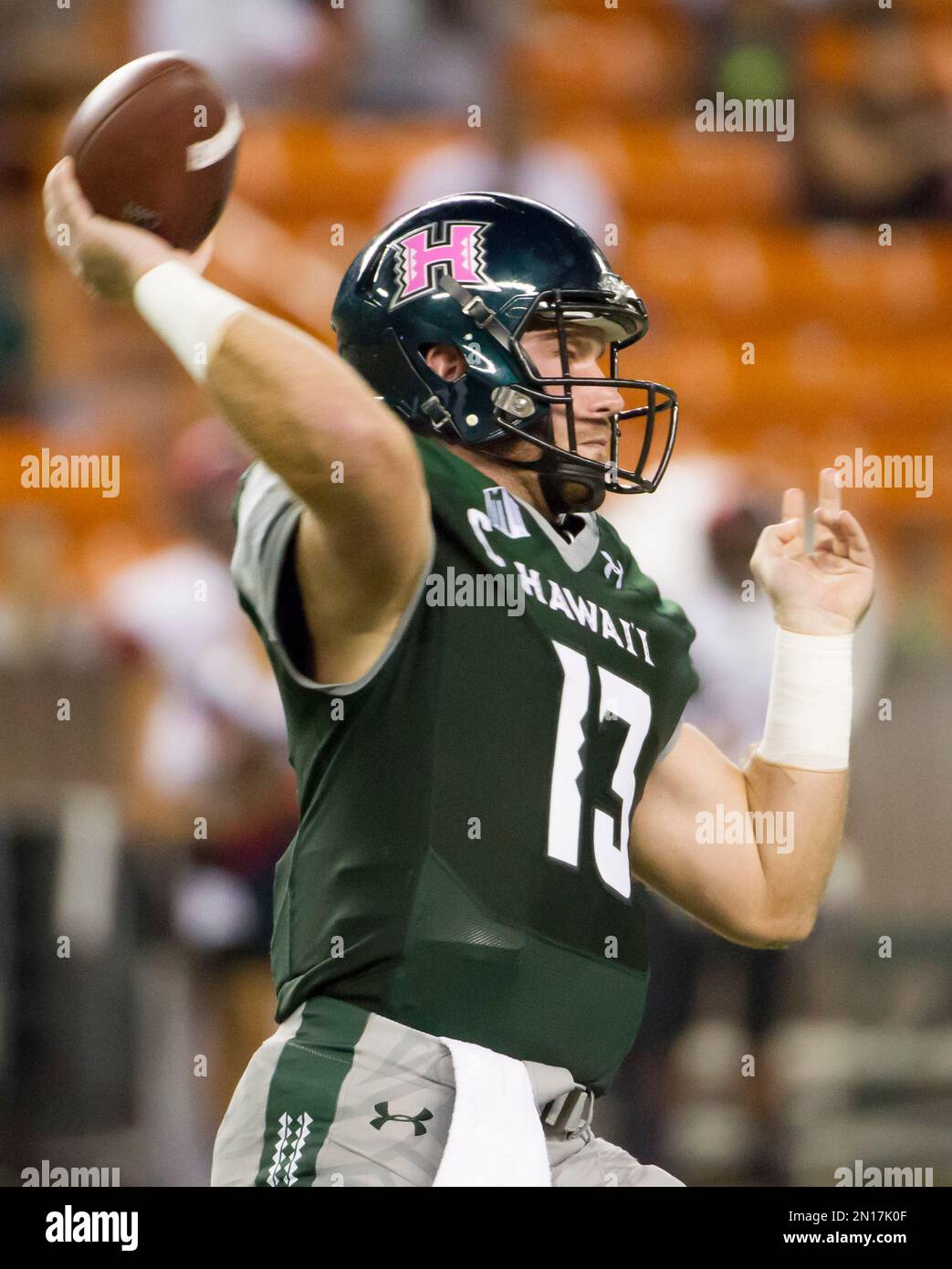 Hawaii quarterback Max Wittek (13) drops back to pass in the third ...