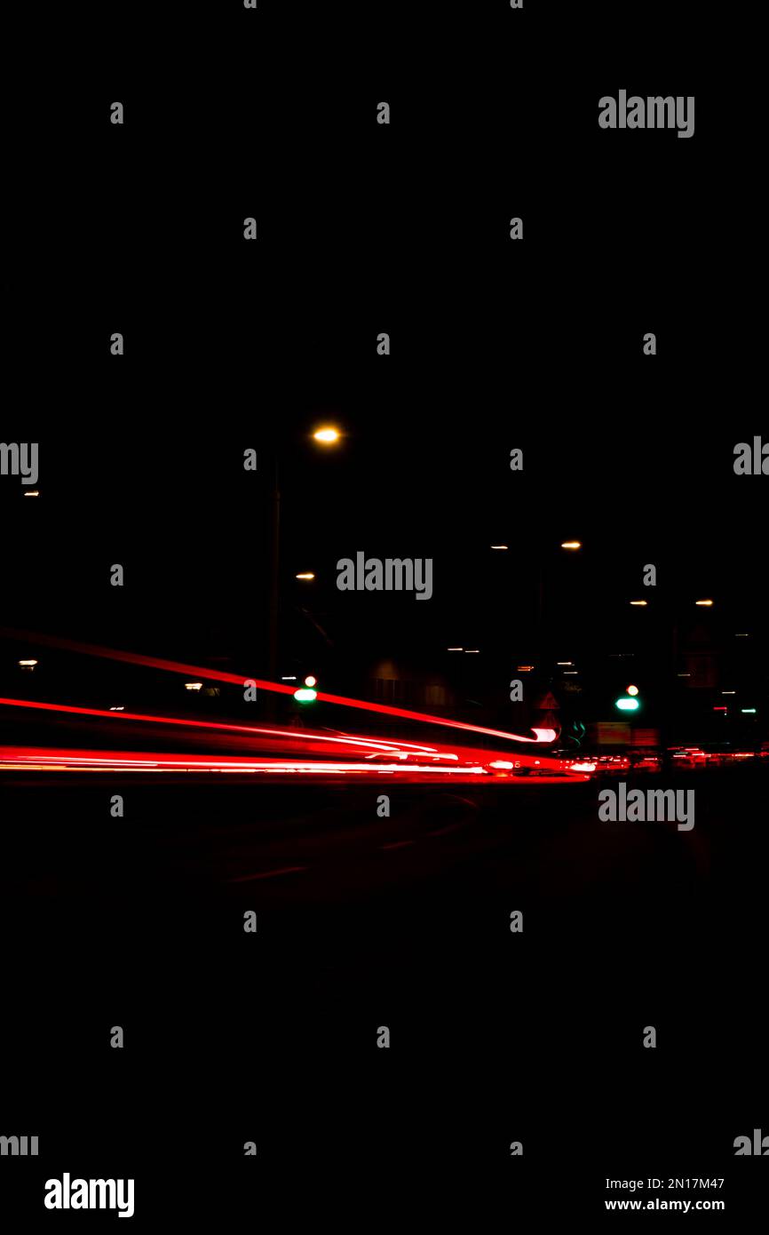 Lights of cars at night. Street line lights. Night highway city. Long ...