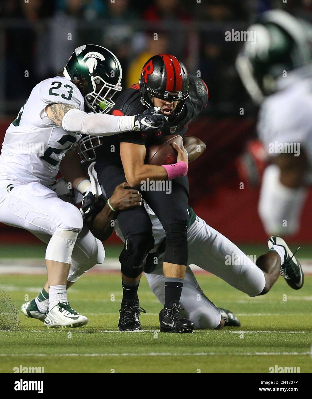 Michigan State linebacker Chris Frey (23) and defensive end Shilique ...