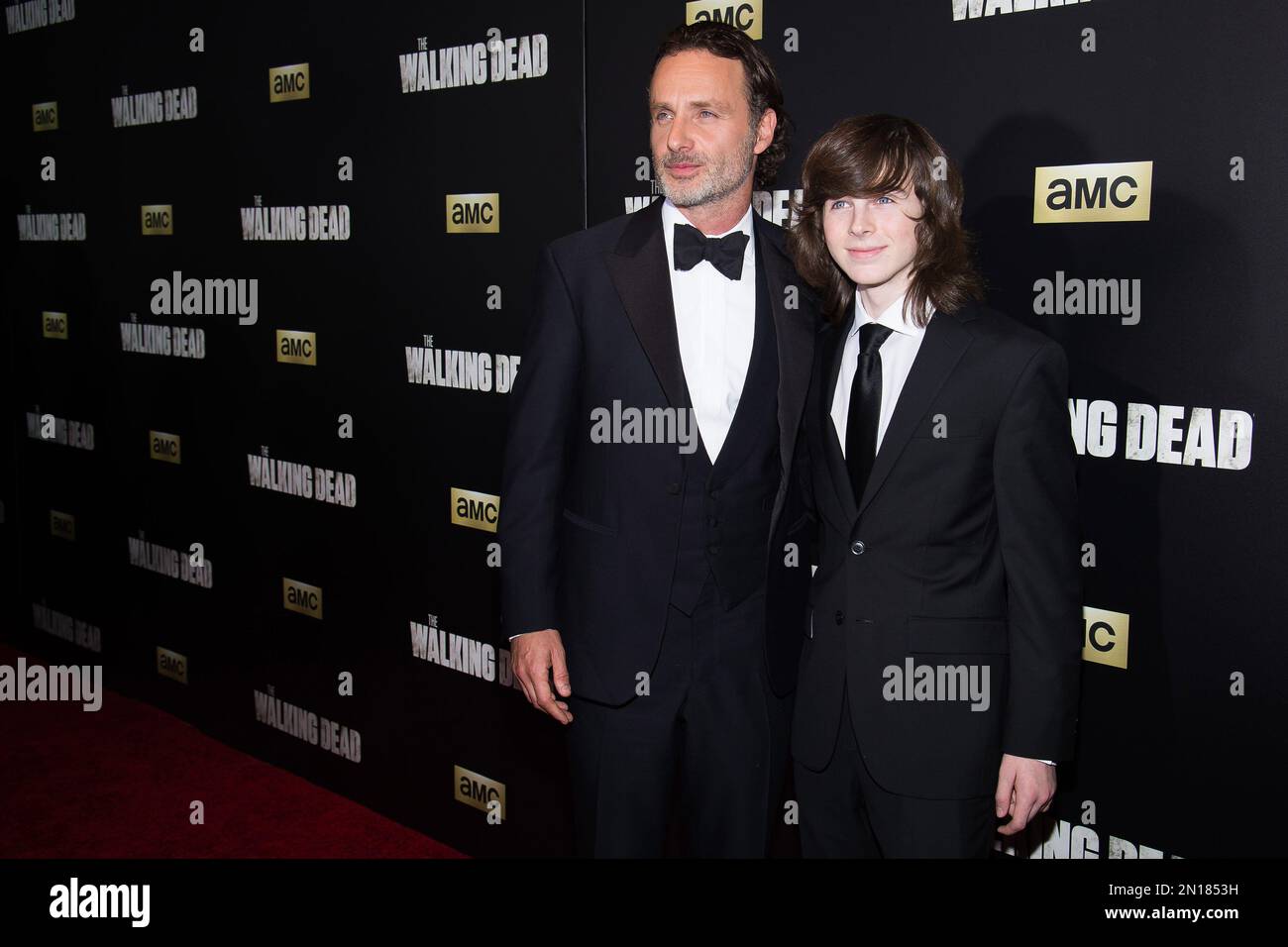 Andrew Lincoln, left, and Chandler Riggs attend AMC's "The Walking Dead ...