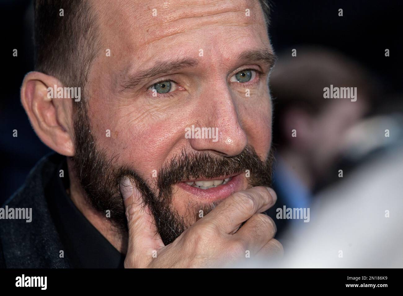 Actor Ralph Fiennes poses for photographers upon arrival at the ...