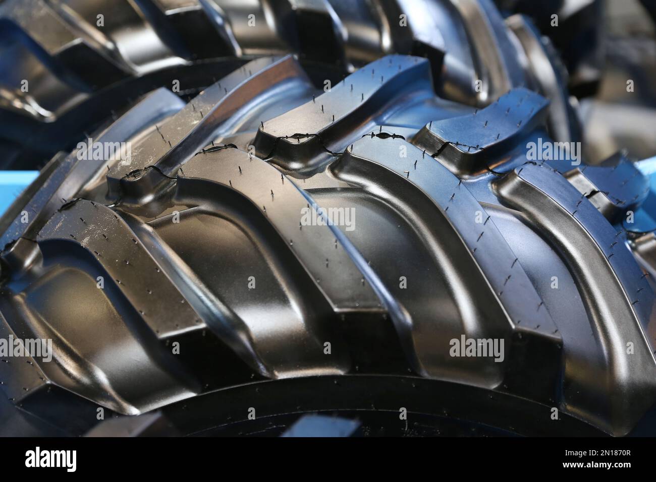 Details of tractor tire. Detail of large wheel. Heavy black wheel ...